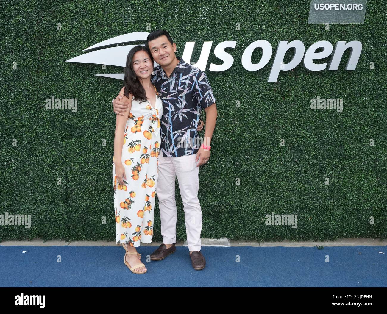 Actor, Ronny Chieng and his wife Hannah Pham arrive to a women's singles match at the 2022 US ...
