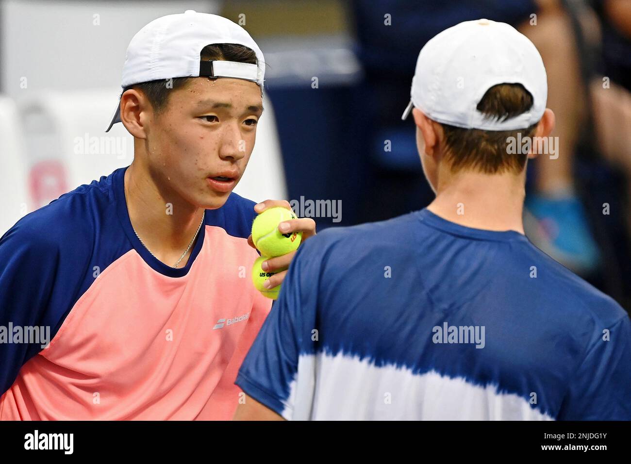 Mitchell Lee and Cooper Woestendick during a junior boys' doubles match at the 2022 US Open ...