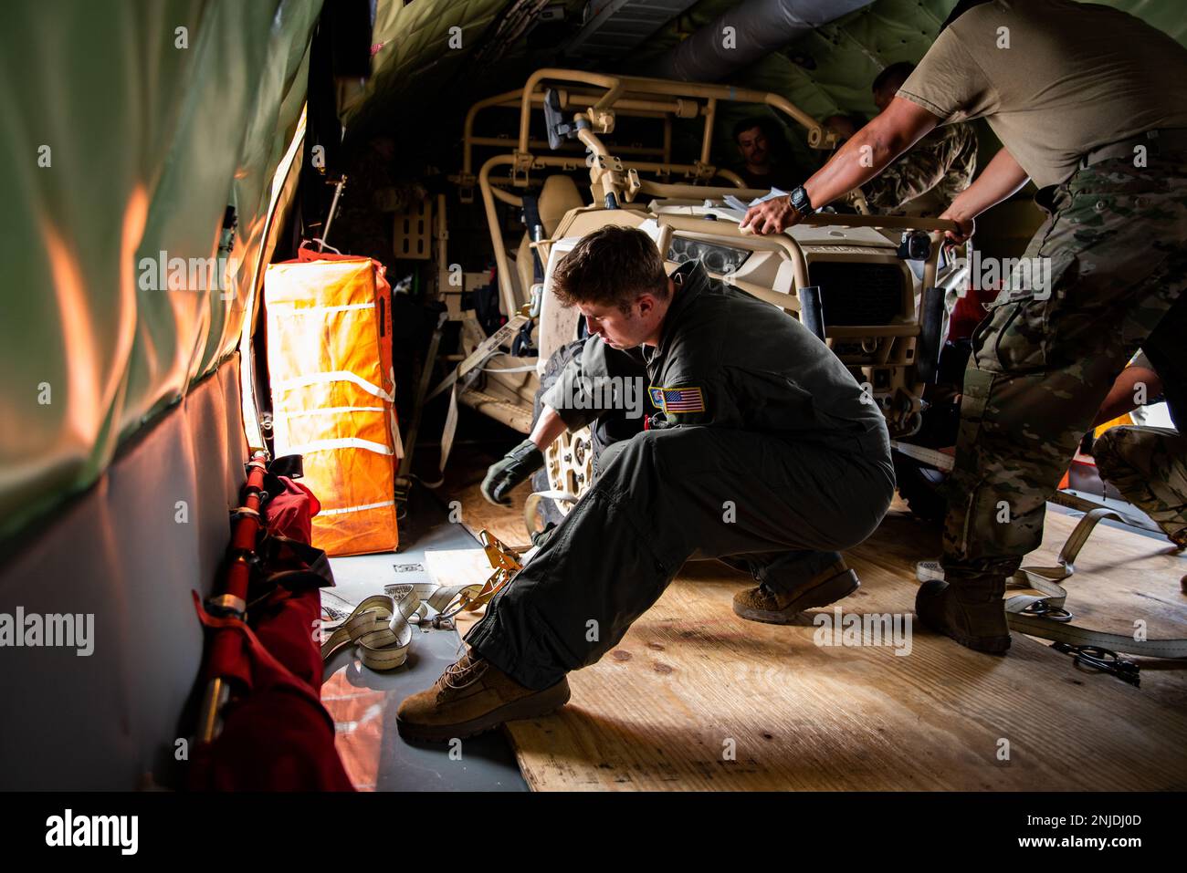 Airmen from the 151st Air Refueling Wing loaded a Polaris Military ...