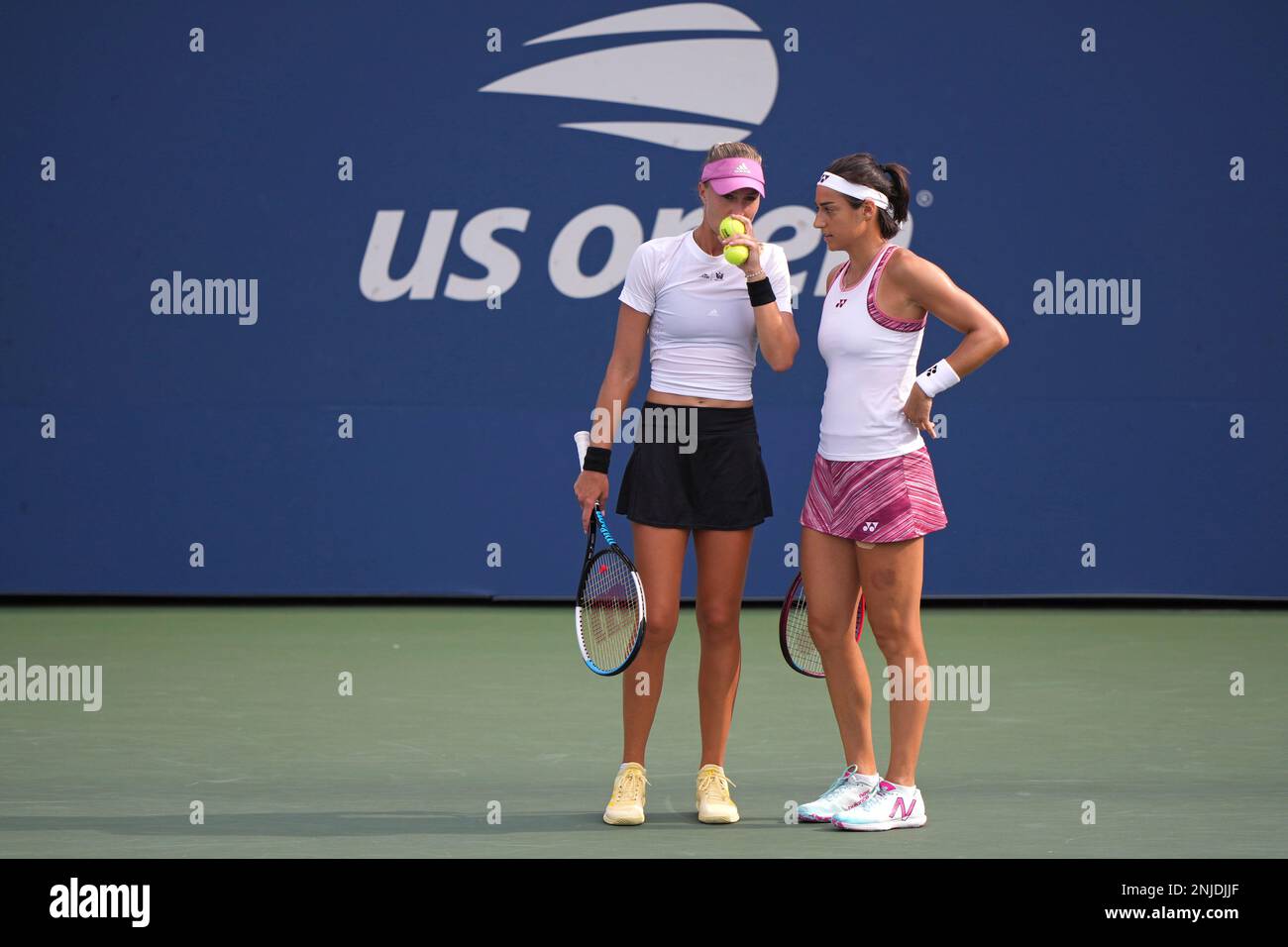 Kristina Mladenovic and Caroline Garcia in action during a women's ...