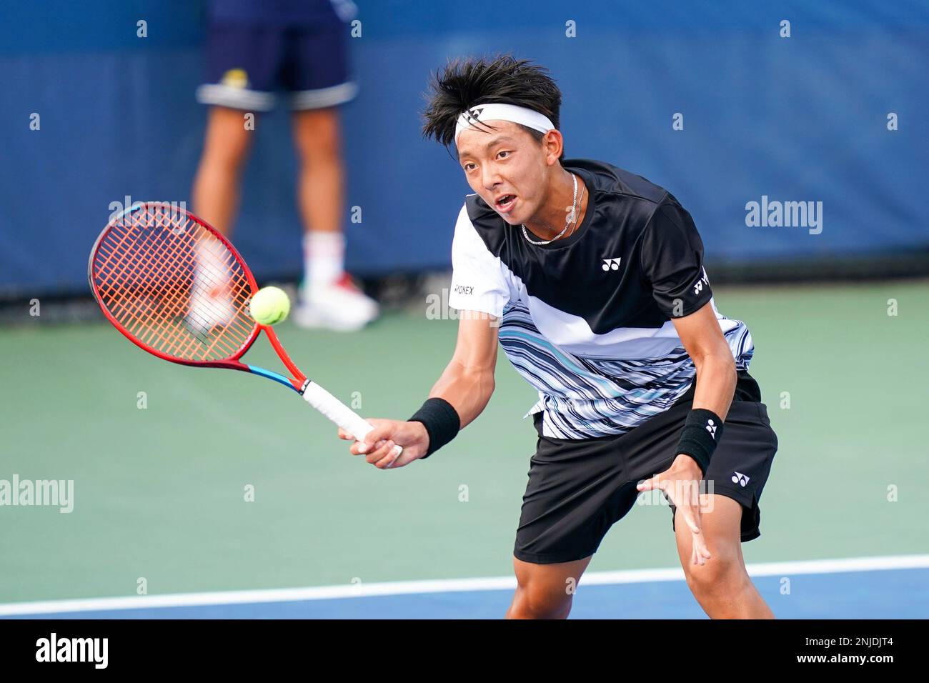 Aidan Kim in action during a junior boys' singles match at the 2022 US ...