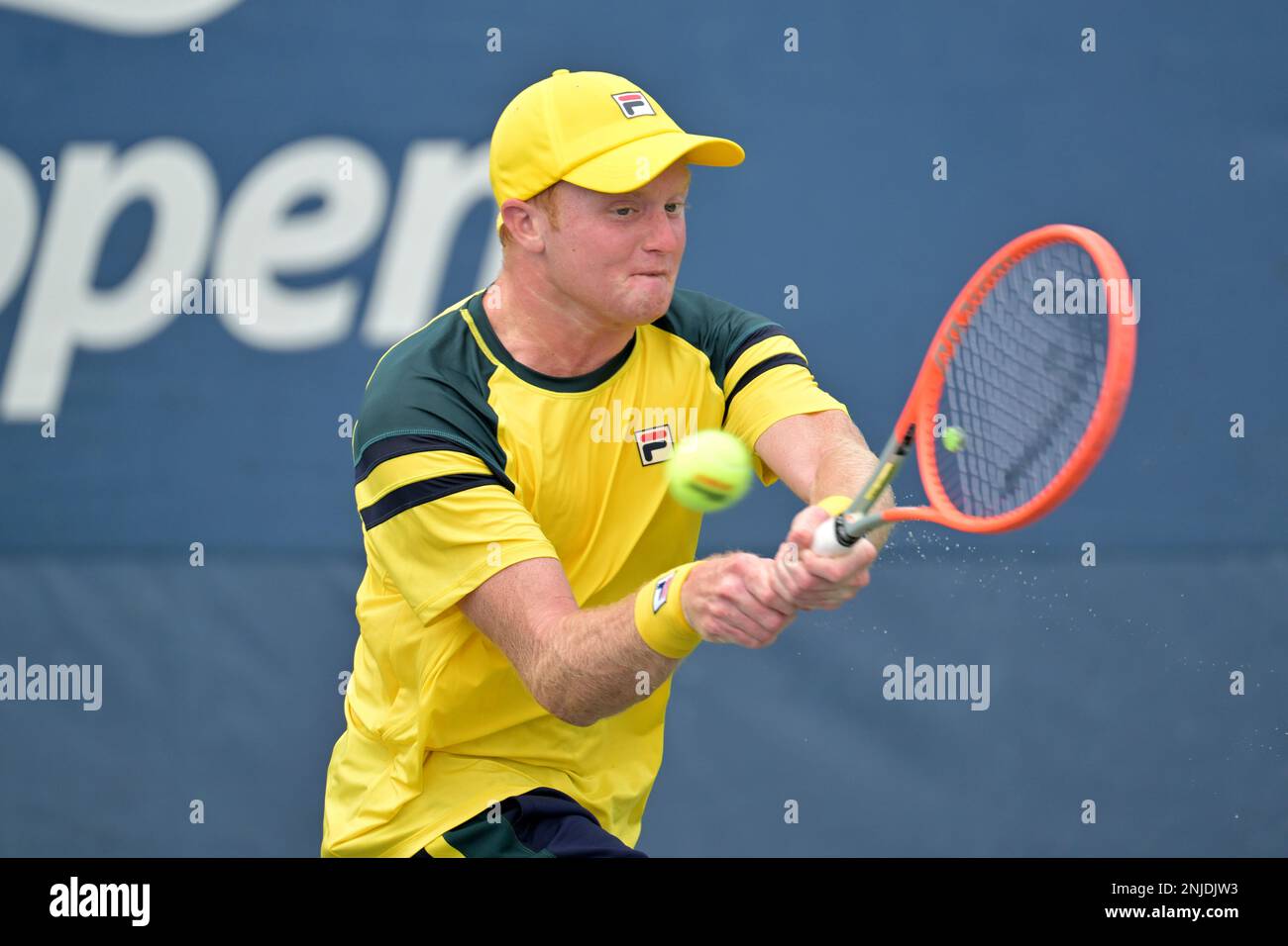 Jonah Braswell in action during a junior boys' singles match at the ...