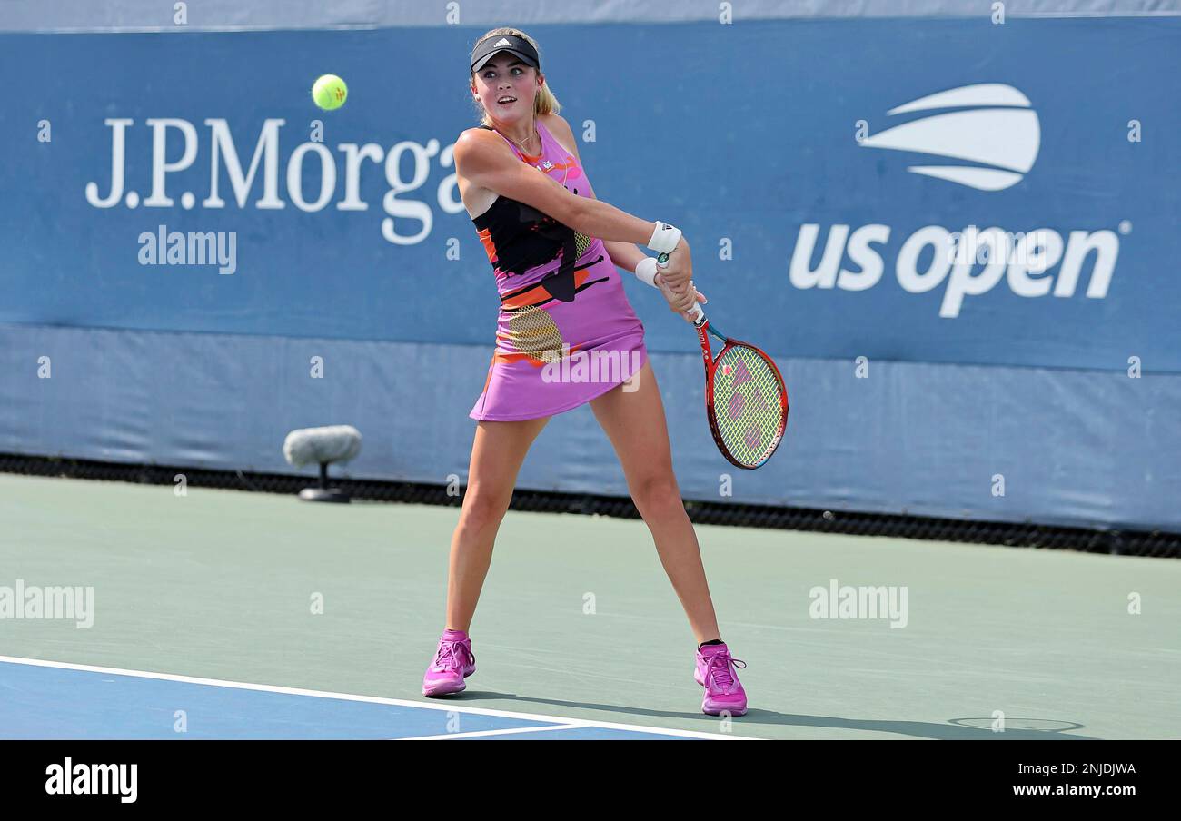 Liv Hovde returns during a junior girls' singles match at the 2022 US ...