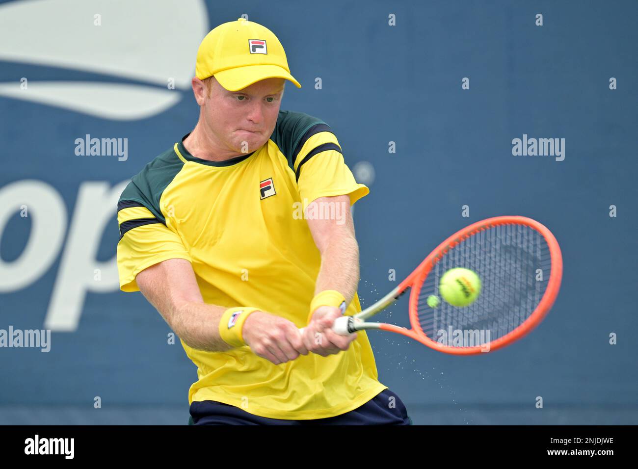 Jonah Braswell in action during a junior boys' singles match at the ...
