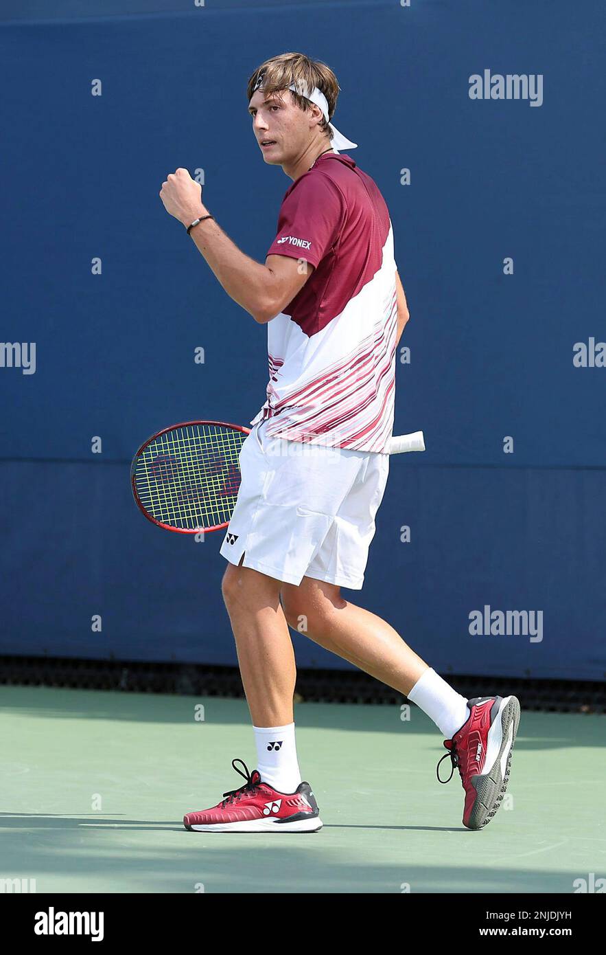 Lautaro Midon reacts during a junior boys' singles match at the 2022 US ...