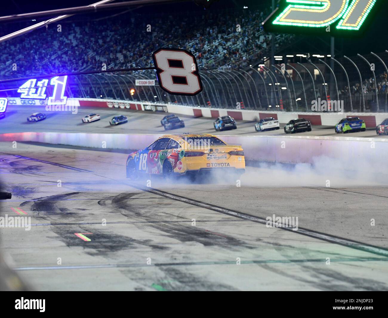 DARLINGTON, SC - SEPTEMBER 04: Smoke billows from the car of Kyle Busch ...
