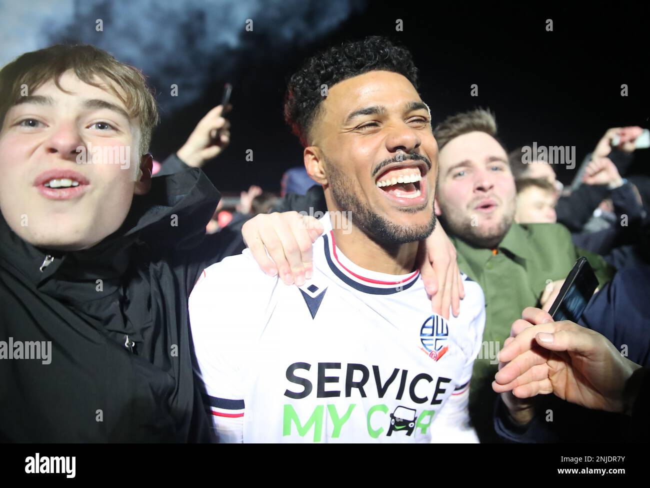 Bolton Wanderers' Elias Kachunga celebrates with fans after the Papa ...