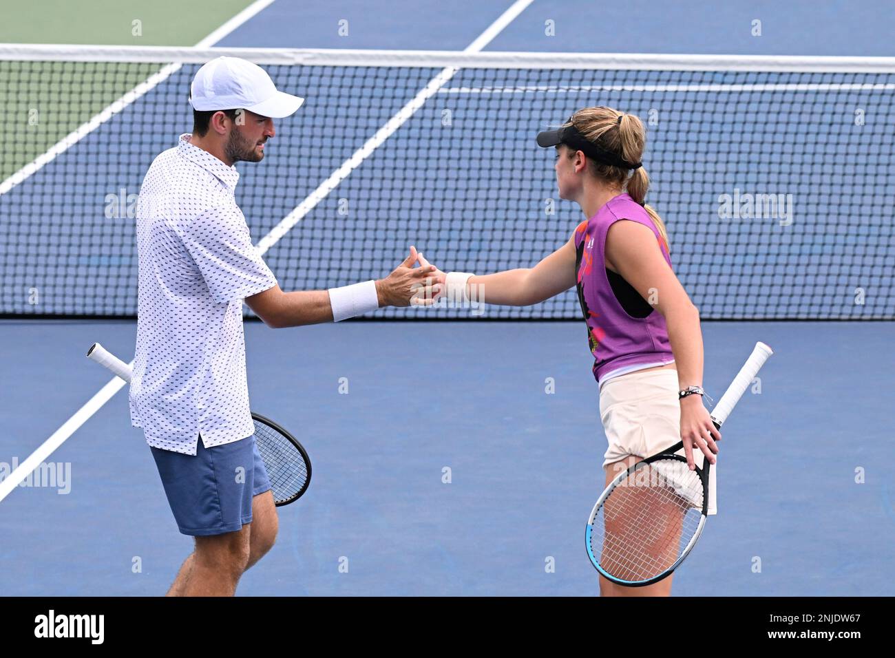 William Blumberg and Caty McNally celebrate during a mixed doubles ...