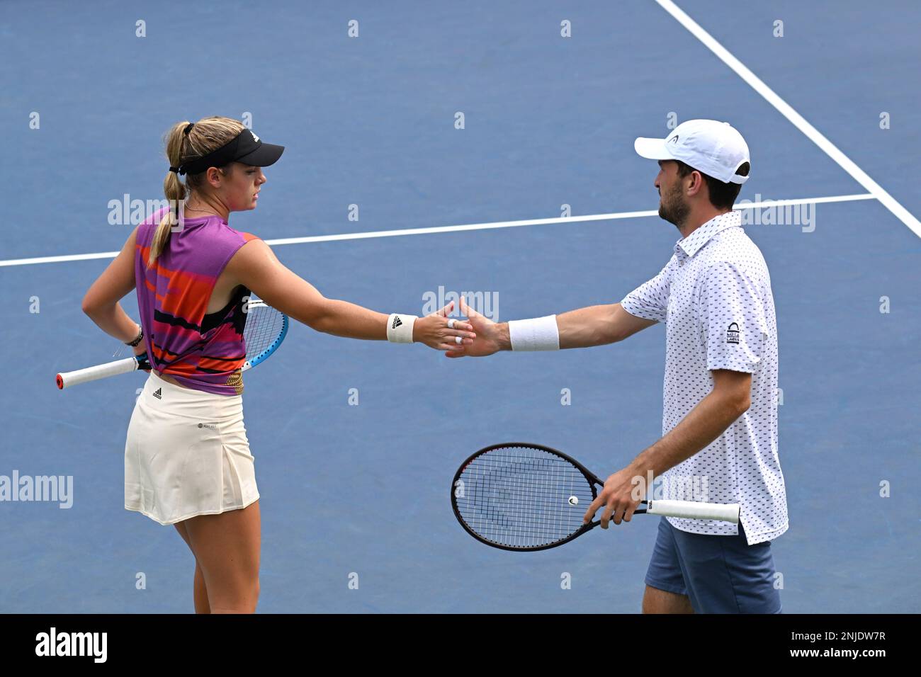 Caty McNally and William Blumberg celebrate during a mixed doubles ...