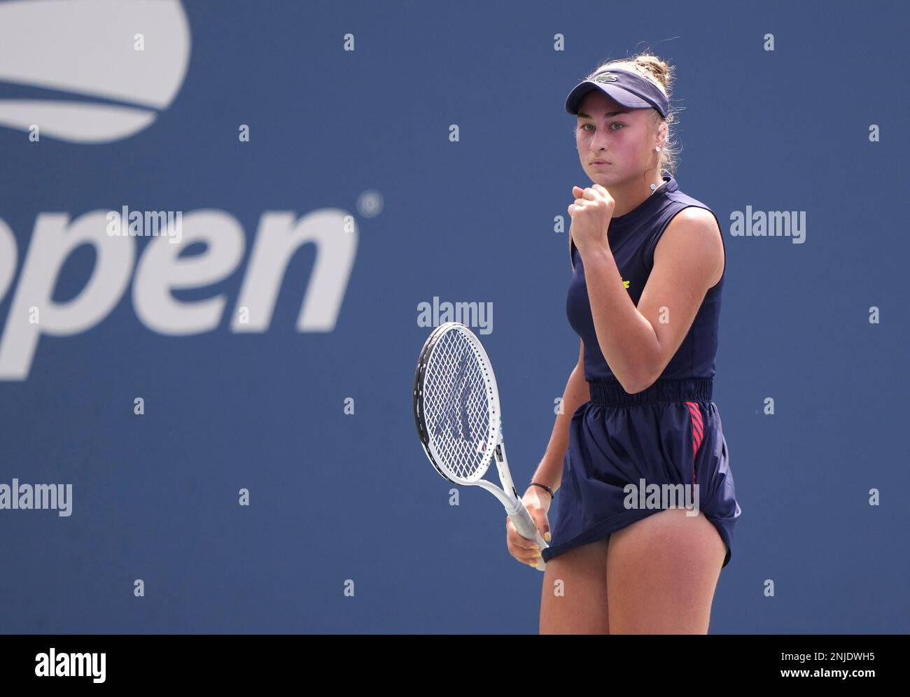 Yaroslava Bartashevich in action during a junior girls' singles match ...