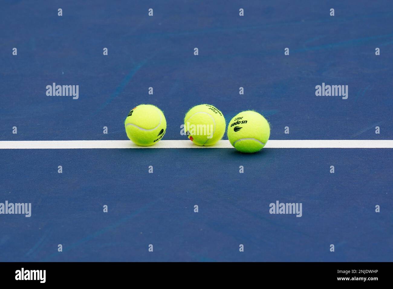 Detailed view of tennis balls during a women's doubles match at the ...
