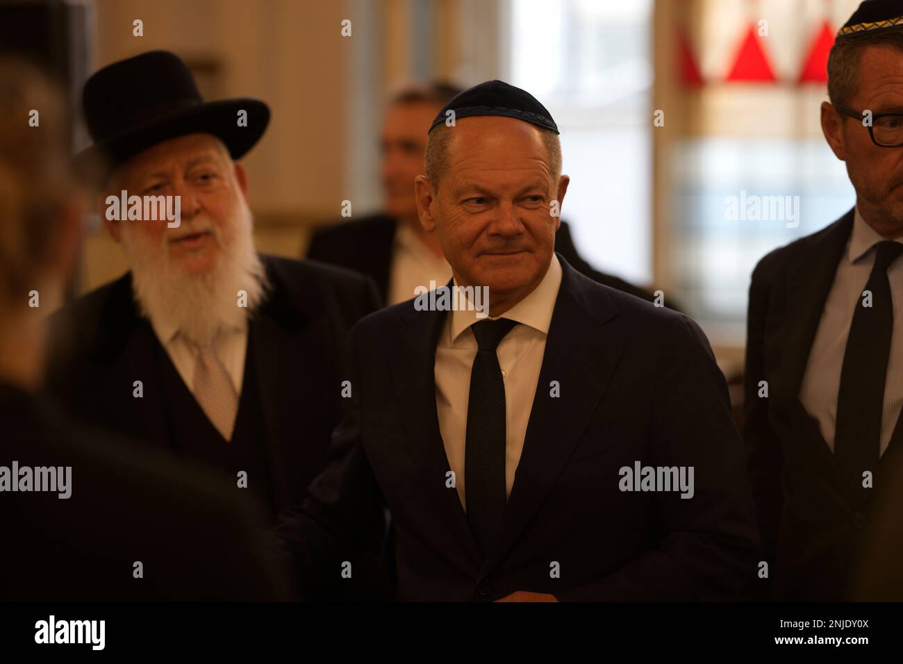 German Chancellor Olaf Scholz arrives for a ceremony marking the 25th ...