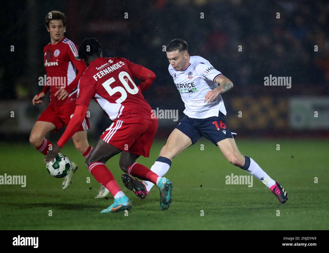 Accrington Stanley's Baba Fernandes (left) and Bolton Wanderers' Aaron ...