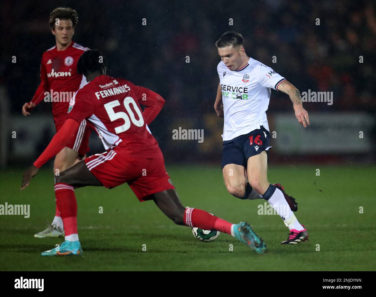 Accrington Stanley's Baba Fernandes (left) and Bolton Wanderers' Aaron ...
