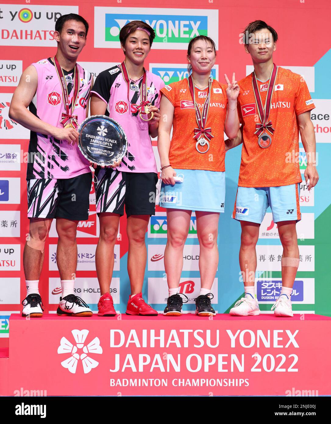 Thai Dechapol Puavaranukroh (L) and Sapsiree Taerattanacha celebrate after defeating Japanese ...