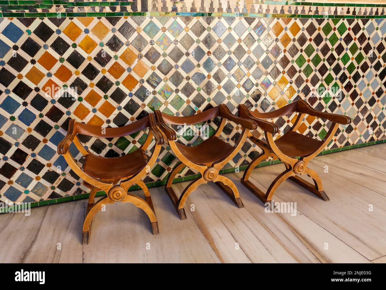 Old wooden chairs with skin (restored) at Myrtle courtyard - Moorish ...