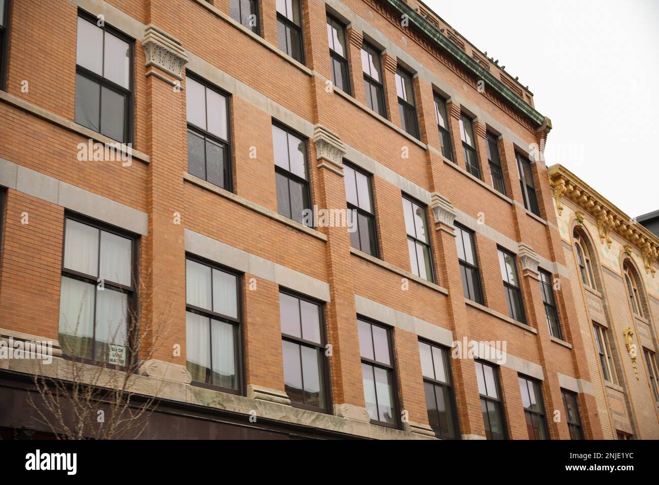 old brick building in city historic exterior apartment town Stock Photo ...