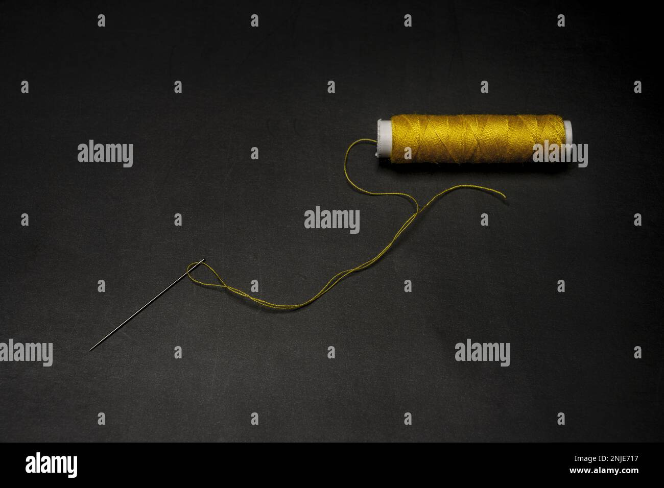 Threaded fabric hi-res stock photography and images - Alamy