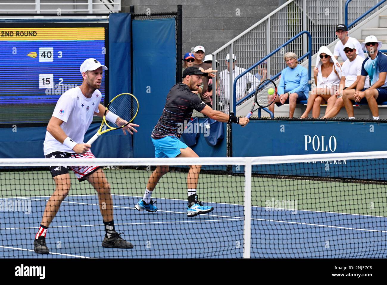Michael Venus and Tim Puetz in action during a men's doubles match at ...