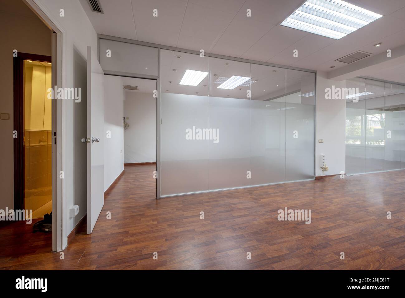 Offices of an empty office with technical ceilings, glass partitions ...