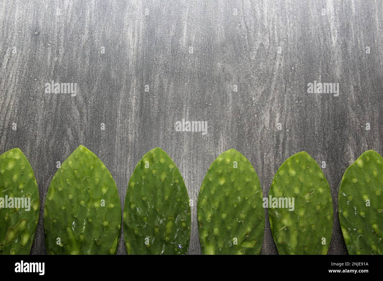 Fresh nopales ready to eat on wooden table, delicious food that comes ...