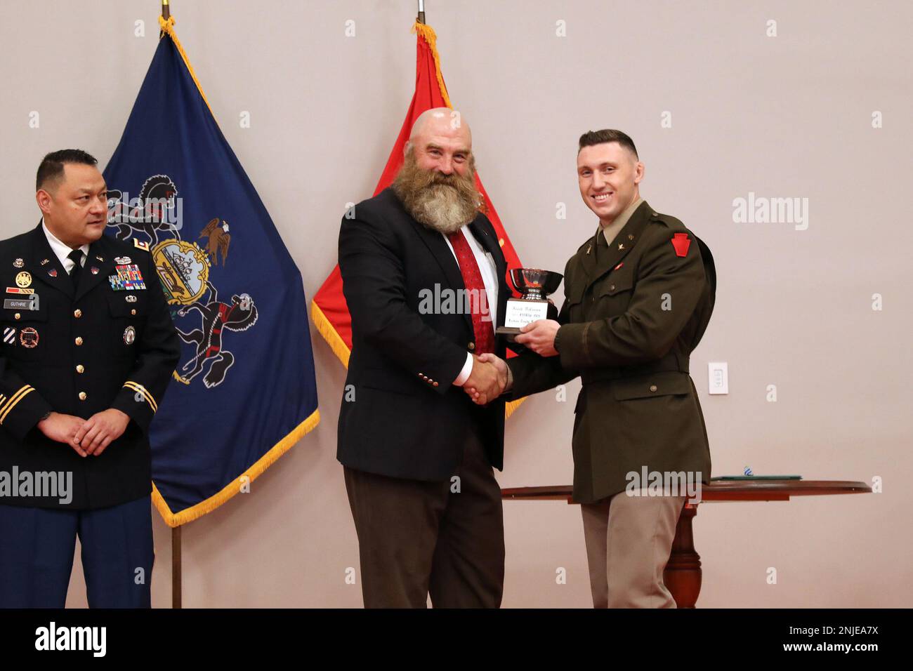 Officer candidate Josiah J. McClarren shakes hands with U.S. Army ...