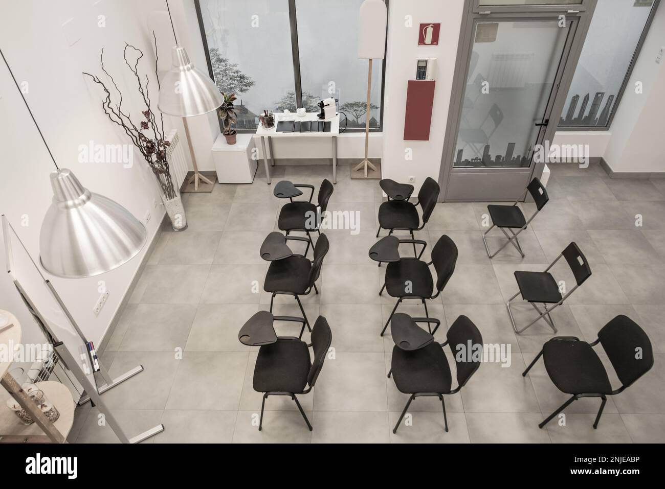 Aerial view of meeting room and study in loft-style room with technical ...