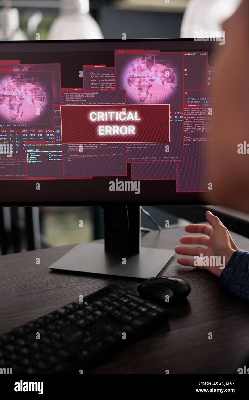 Asian It Programmer Writing Html Code Encountering Hacking Alert On Computer Monitor Dealing