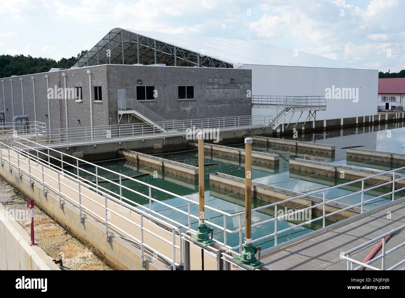 Clouds are reflected on the City of Jackson's O.B. Curtis Water Treatment Facility's ...