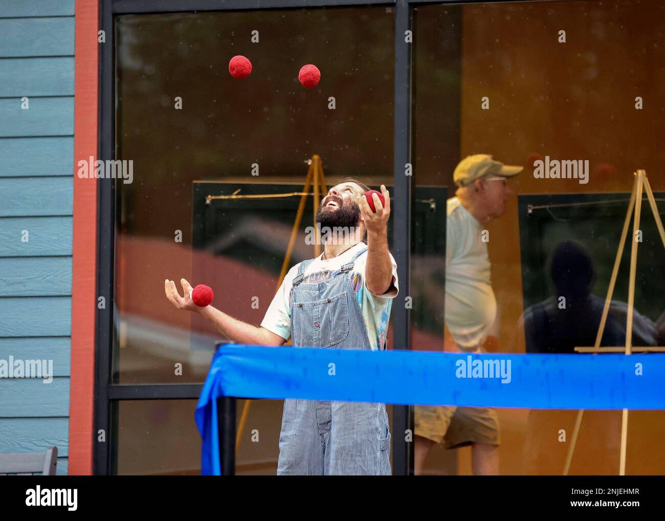 Chandler Corbin juggles before the grand opening ceremony of the Damascus Trail Center in ...