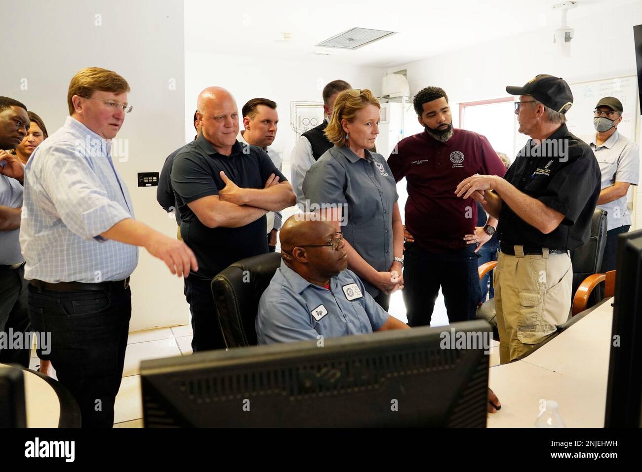 Jim Craig, with the Mississippi State Department of Health, right ...