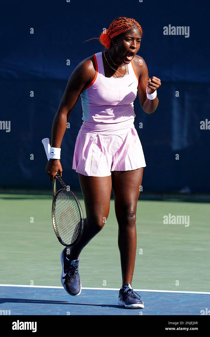 Clervie Ngounoue reacts during a women's doubles match at the 2022 US ...