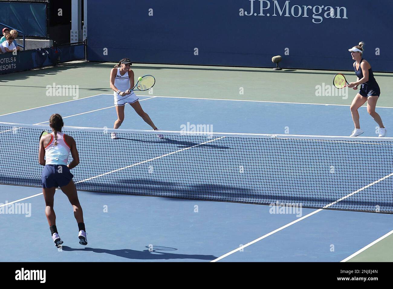 Giuliana Olmos returns during a women's doubles match at the 2022 US ...