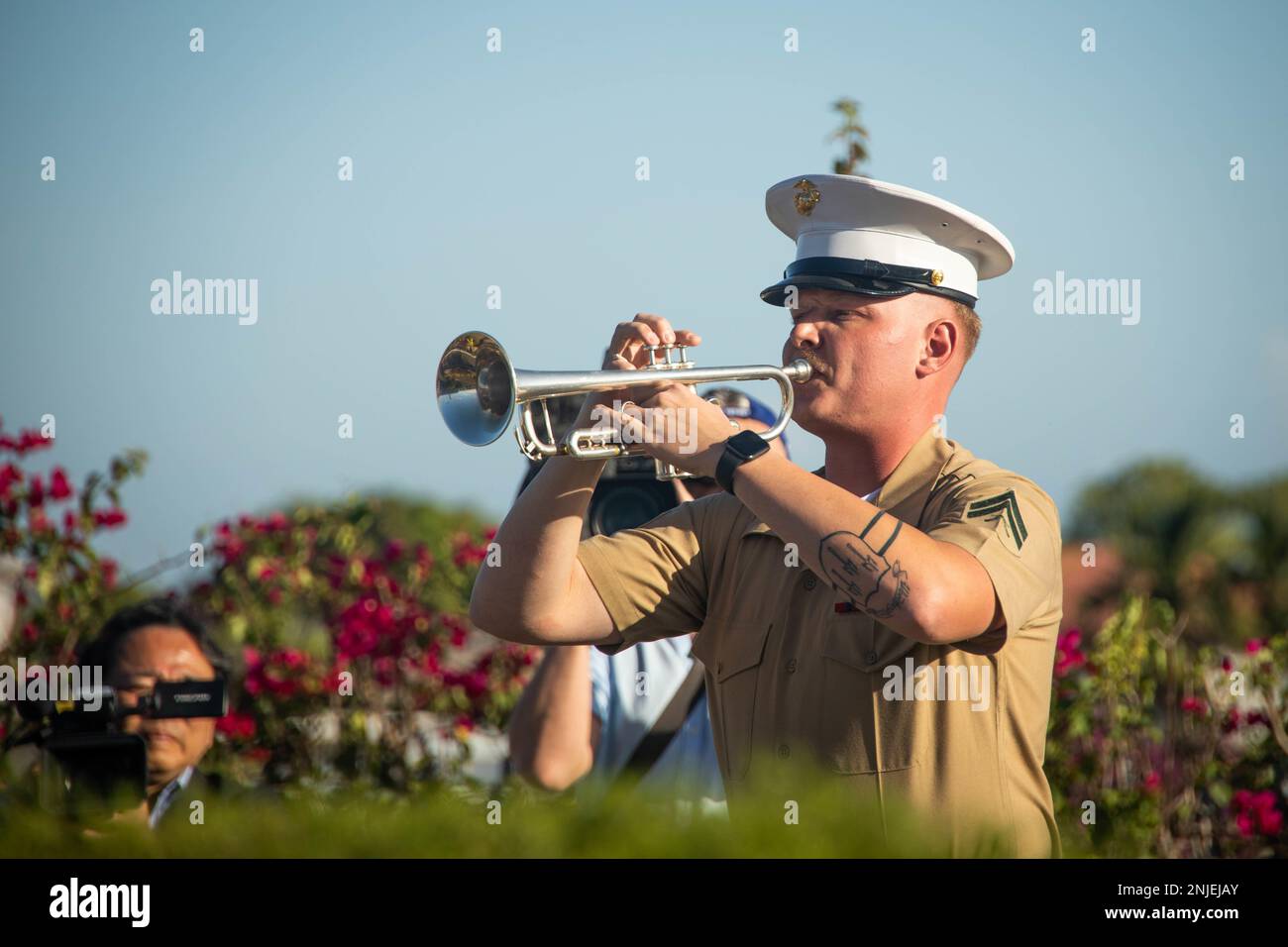 U.S. Marine Corps Cpl. Ryan Worthington, a brass quartet trumpet player ...