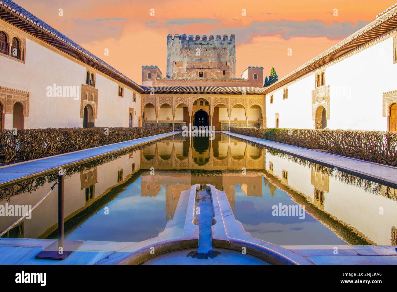 myrtle courtyard of 14th century - pink sunset in Alhambra old Moorish ...