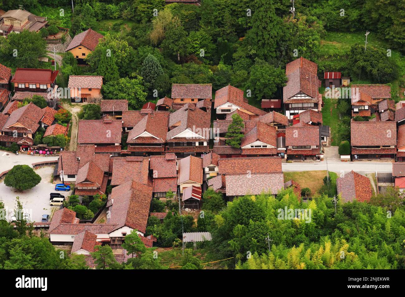 An aerial photo shows the townscape of the red iron oxide colored roof ...