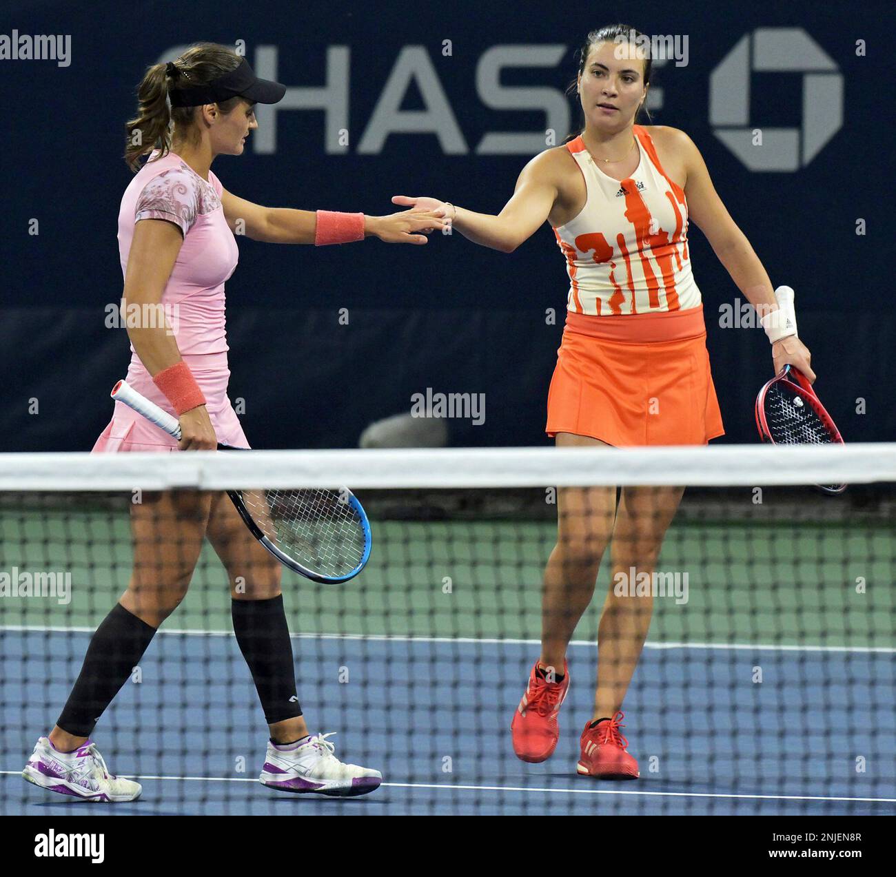 Monica Niculescu and Elena-Gabriela Ruse high five during a women's ...