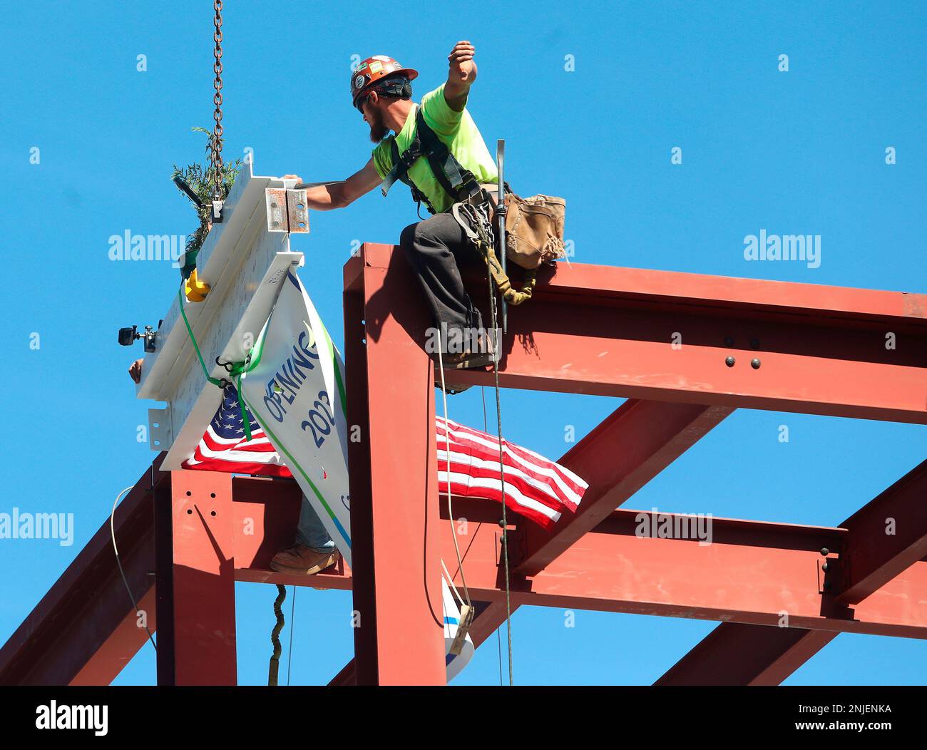 SEK Construction ironworkers set the final beam at the new state-of-the ...