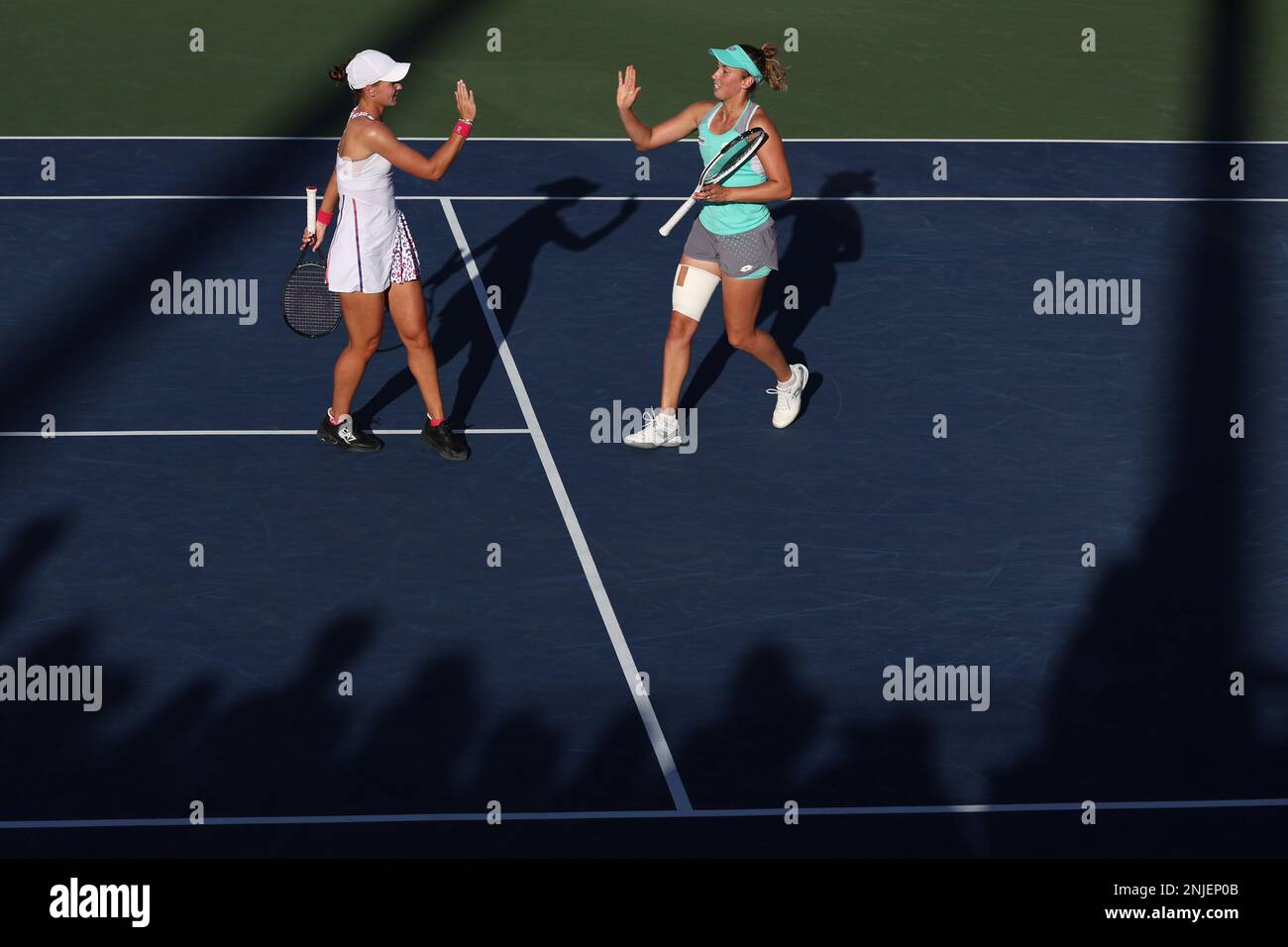 Veronika Kudermetova and Elise Mertens in action during a women's ...