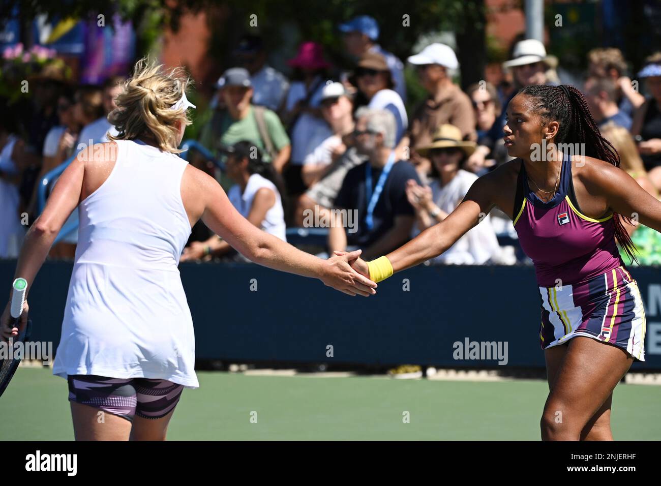 Robin Montgomery and Coco Vandeweghe react during a women's doubles ...