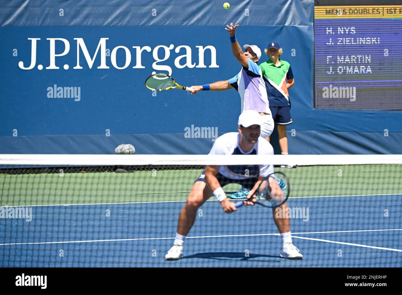 Fabrice Martin and Jonny O'Mara in action during a Men's doubles match ...