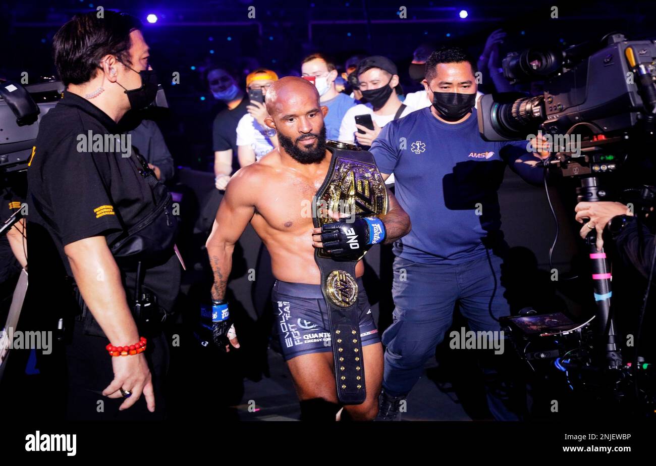 American mixed martial arts (MMA) star Demetrious Johnson (with his ...