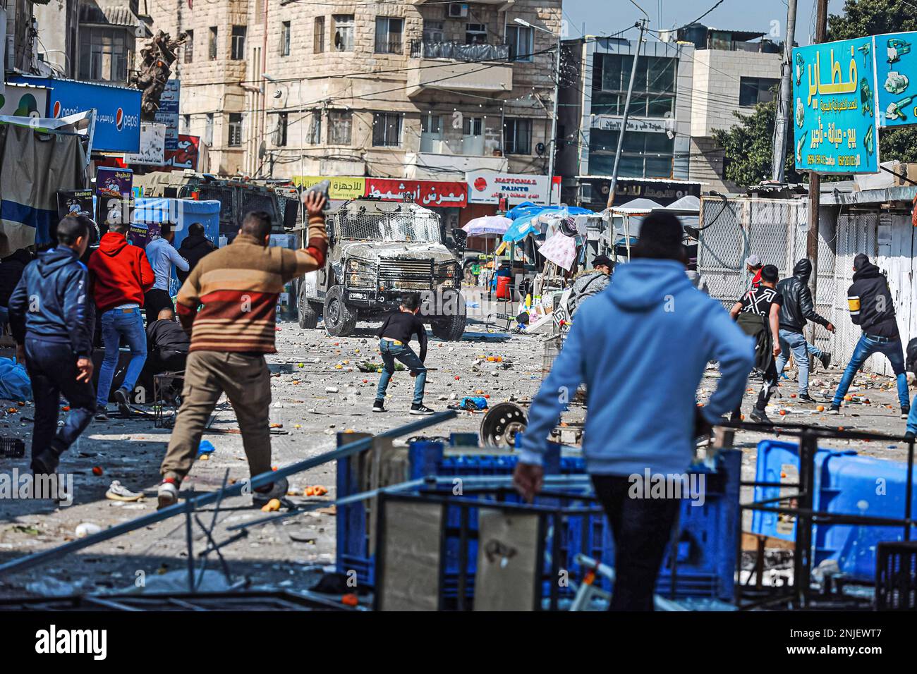 Nablus, Gaza. 22nd Feb, 2023. Palestinians throw stones at Israeli army ...