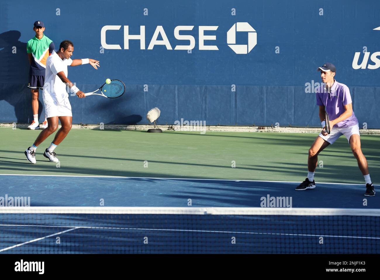 Ramkumar Ramanathan and Nikola Cacic in action during a men's doubles ...