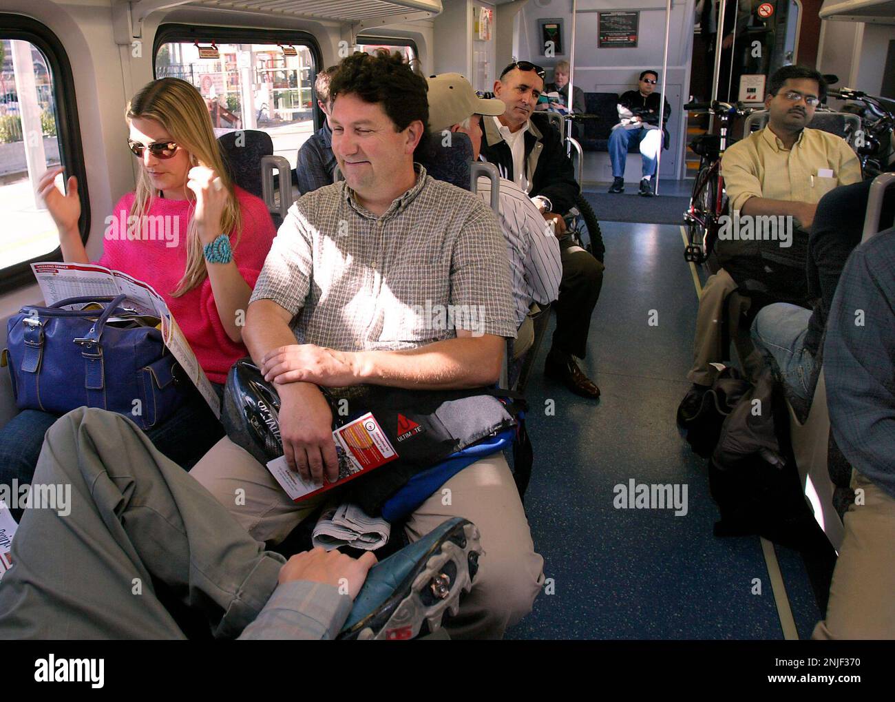 BULLET 033 LH.JPG Caltrain begins its Baby bullet express today. Left to right--Erica Saltiel ...