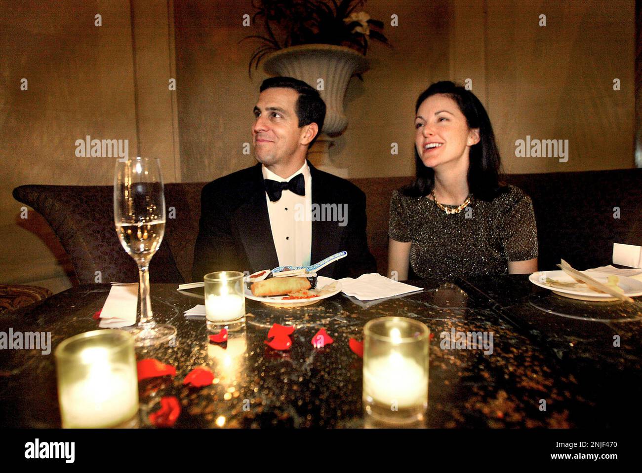 CIRCUIT3003-C-28FEB03-MG-LH--Bertrand and Jessica Yansouni sitting in a ...