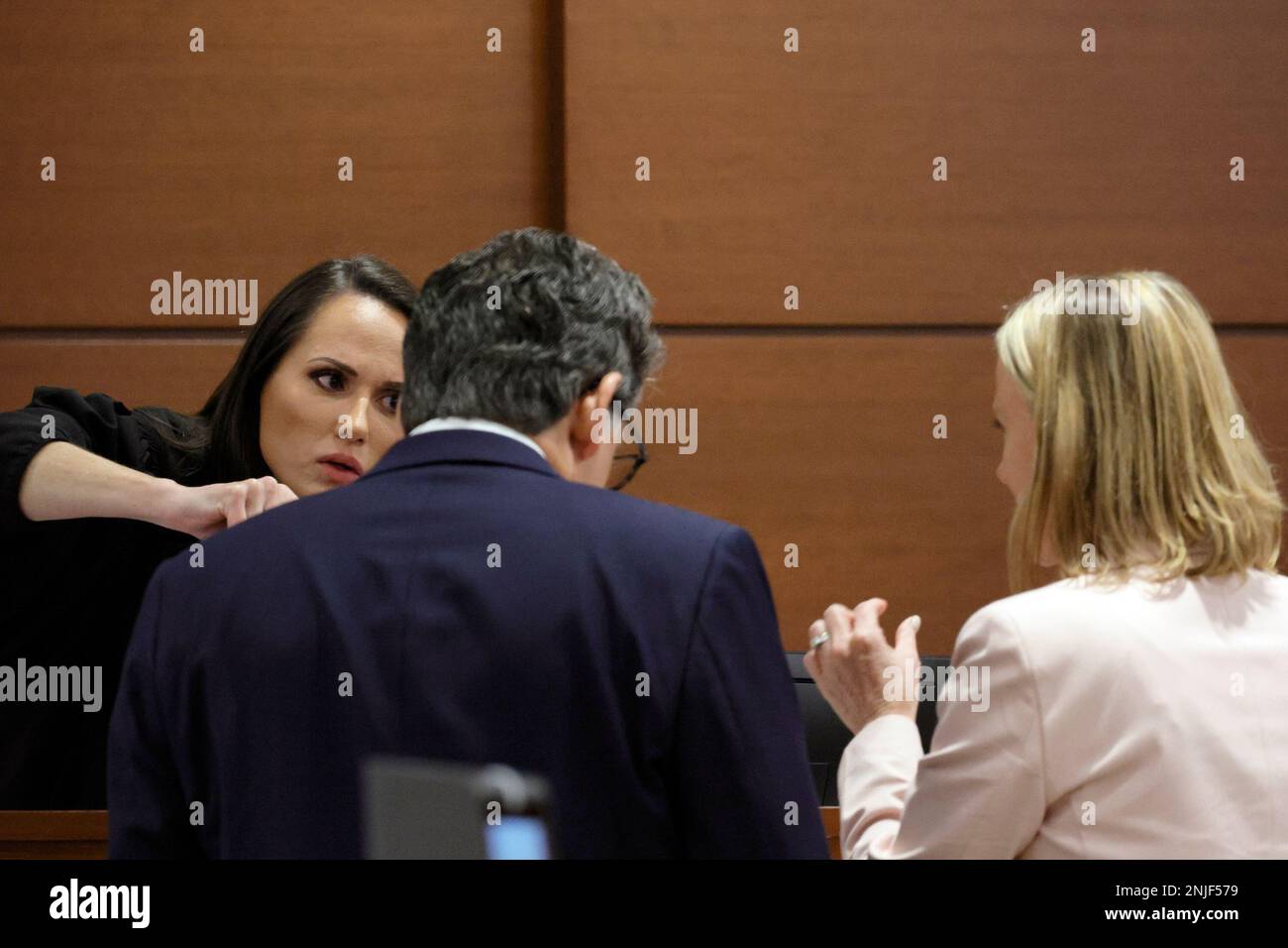 Judge Elizabeth Scherer speaks with Assistant State Attorney Jeff ...