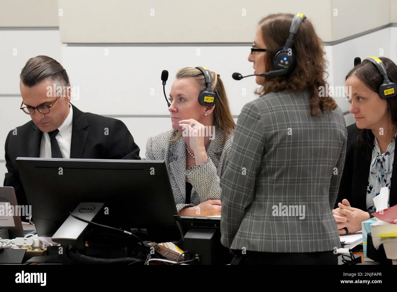 Members of the defense team, from left, Capital defense attorney Casey ...