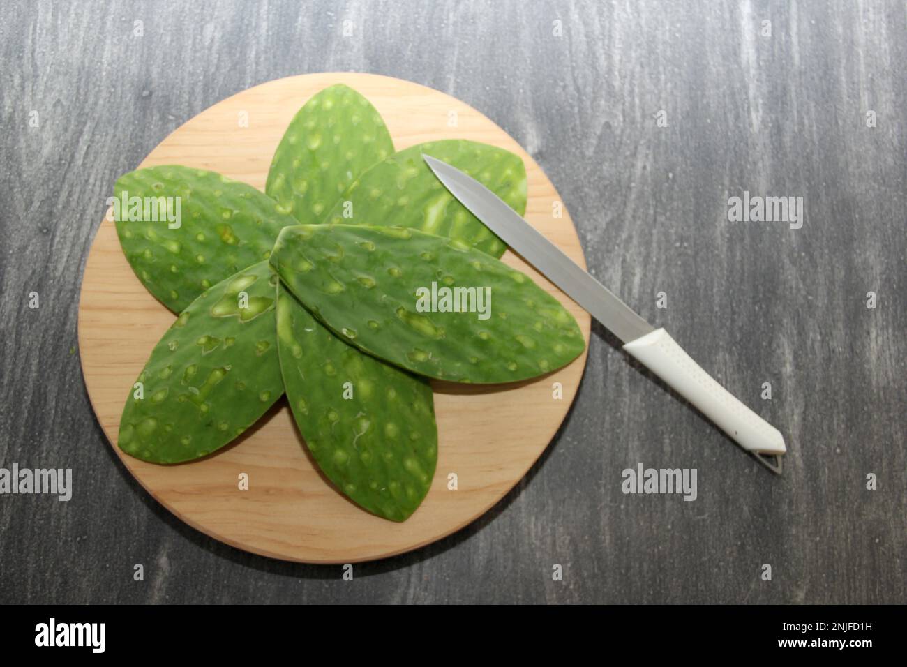 Fresh raw green nopales without bones ready to cook Mexican food on a ...