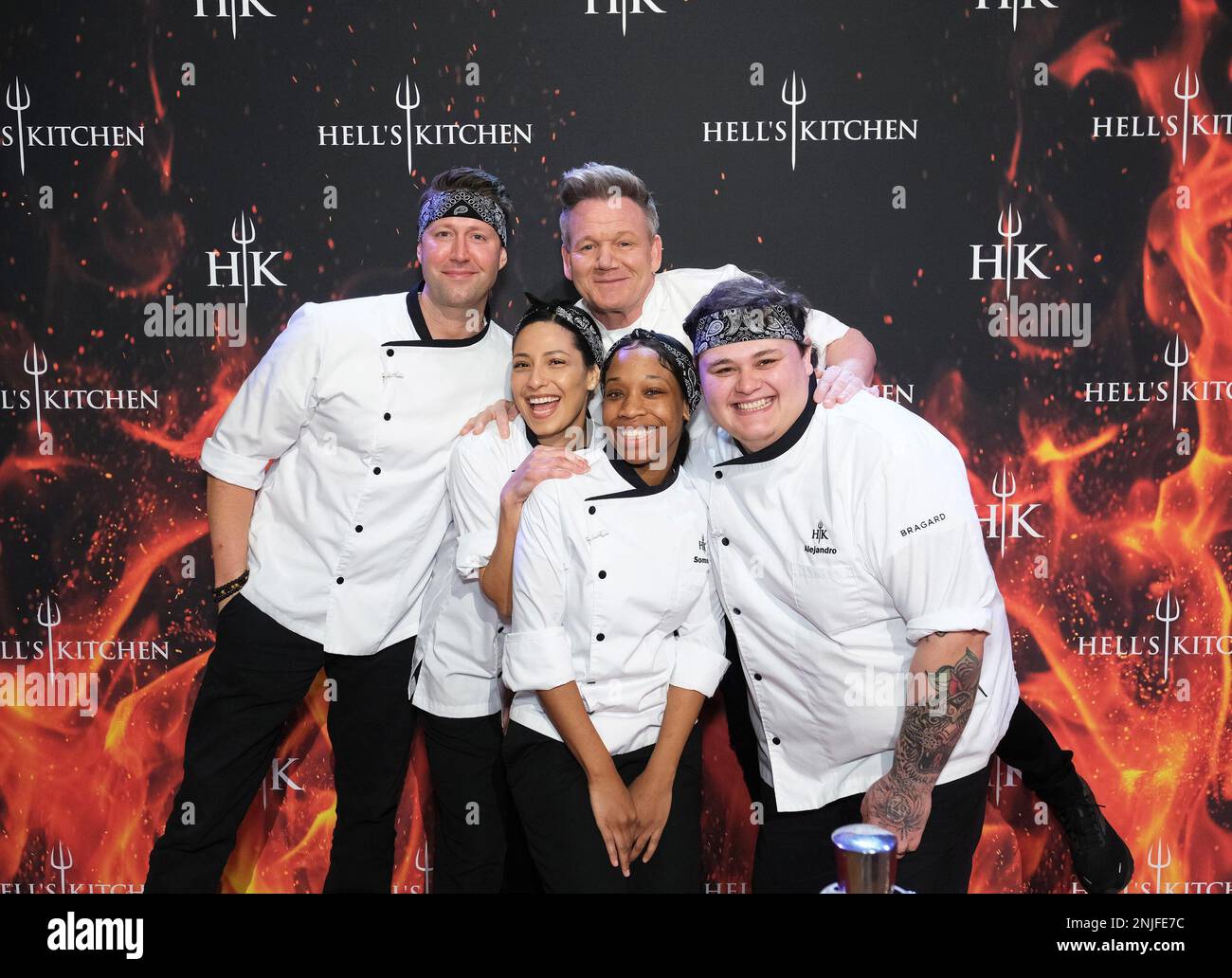 HELL'S KITCHEN, host Gordon Ramsay (back, center) with contestants ...